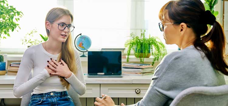 Guide to Becoming a Youth Counselor (Experience, Degrees, Duties)